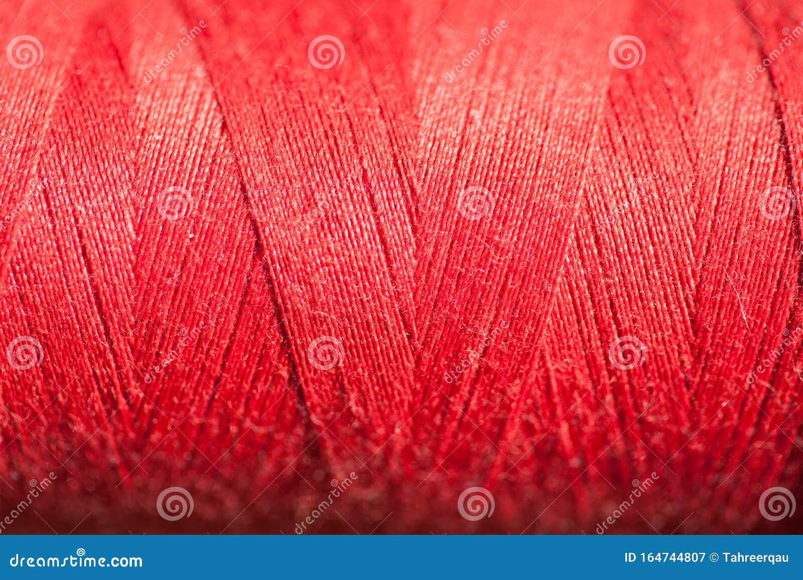 Red thread spool macro stock image. Image of green, macro - 164744807