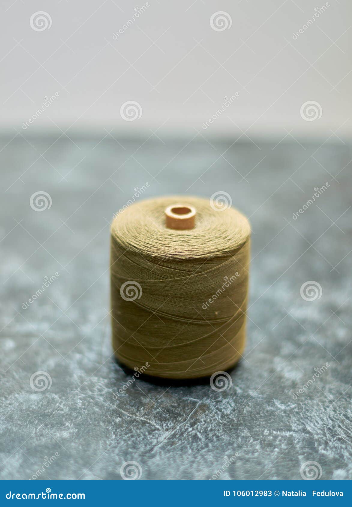 Green thread on the table stock image. Image of creativity - 106012983
