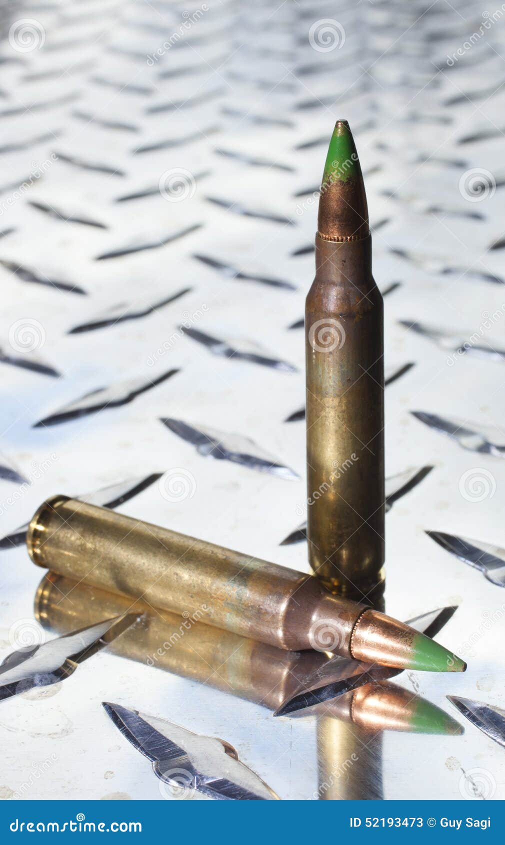 Green Tipped Rifle Shells on Chrome Metal Stock Image - Image of green ...