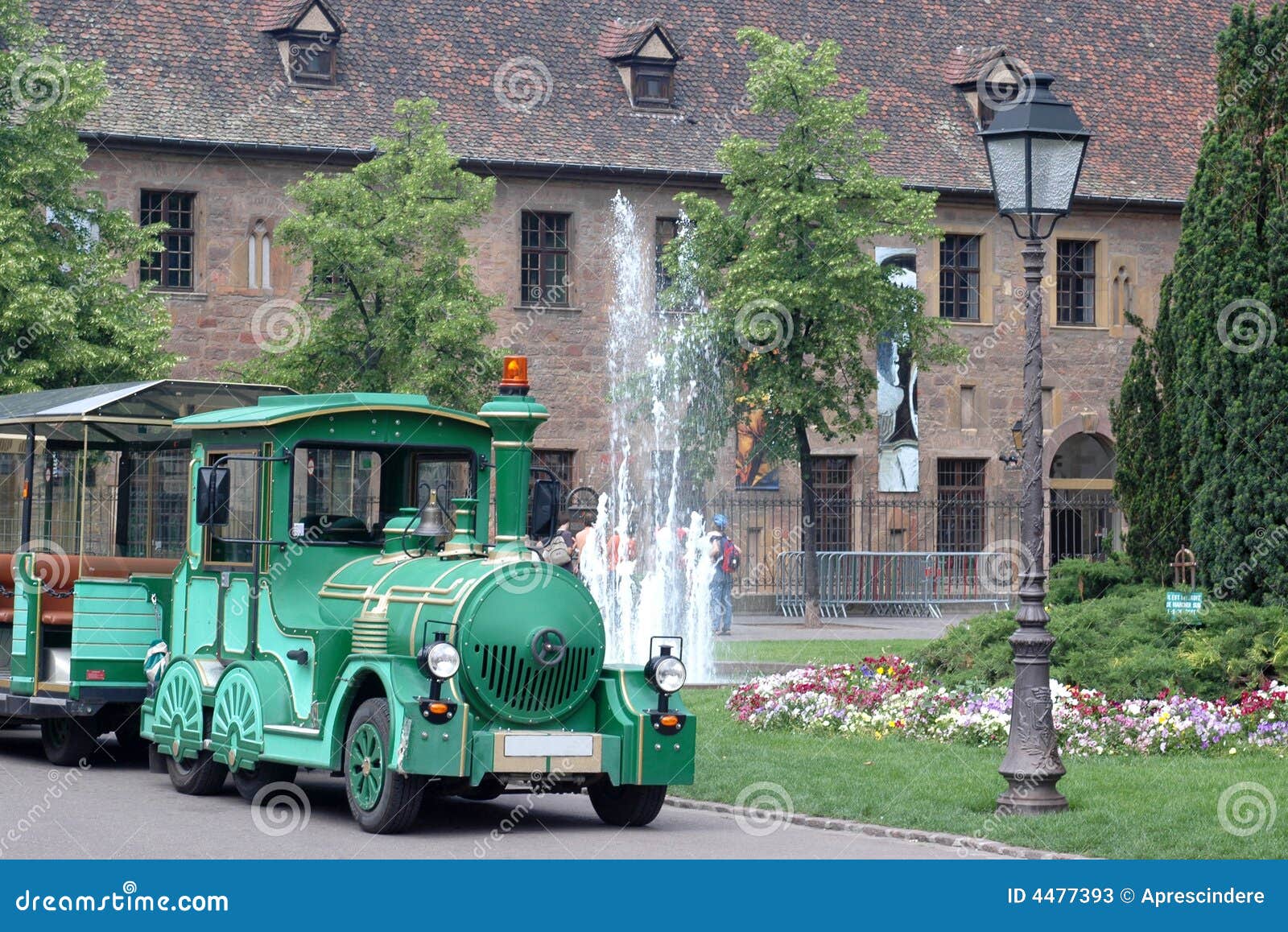 Green tourist train stock image. Image of house, guide - 4477393