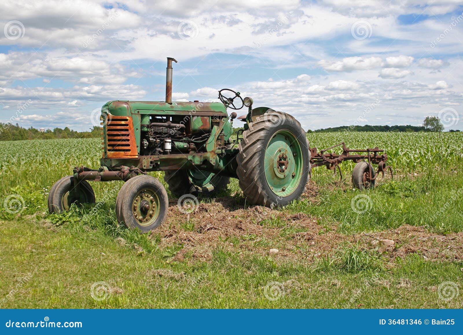 Green tractor stock photo. Image of green, plow, blue - 36481346