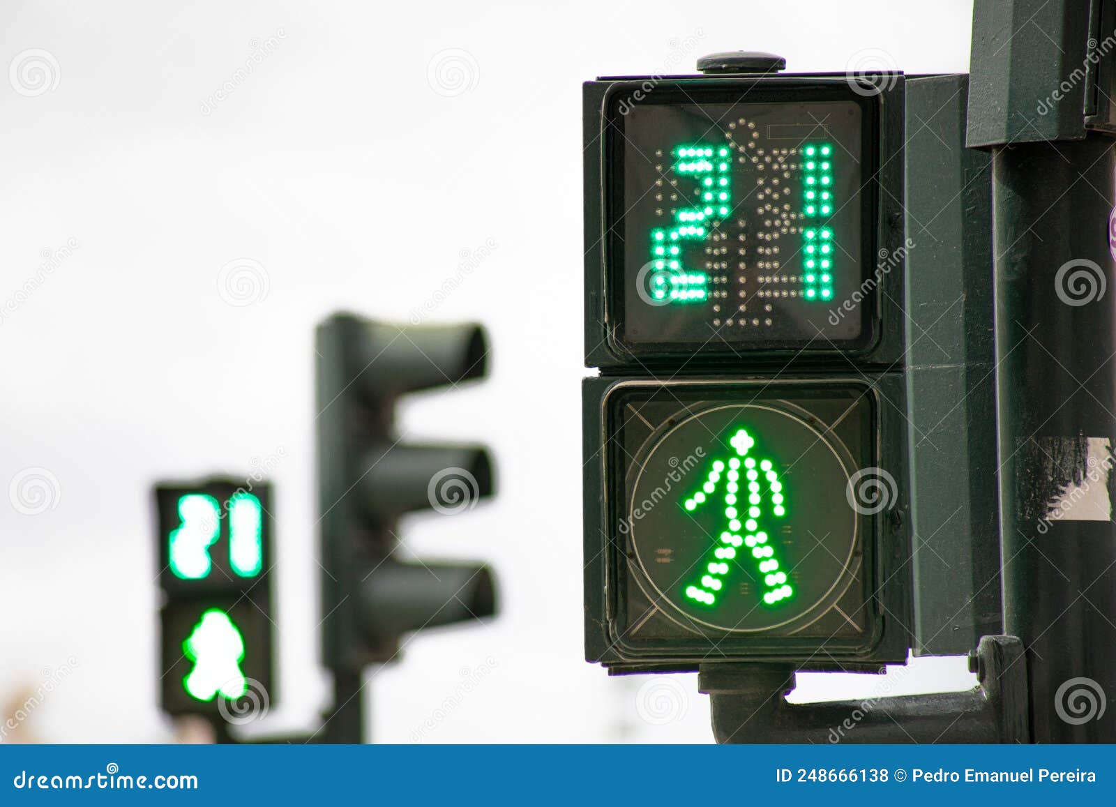Green Traffic Light for Pedestrians Counting Down in 21 Seconds in ...