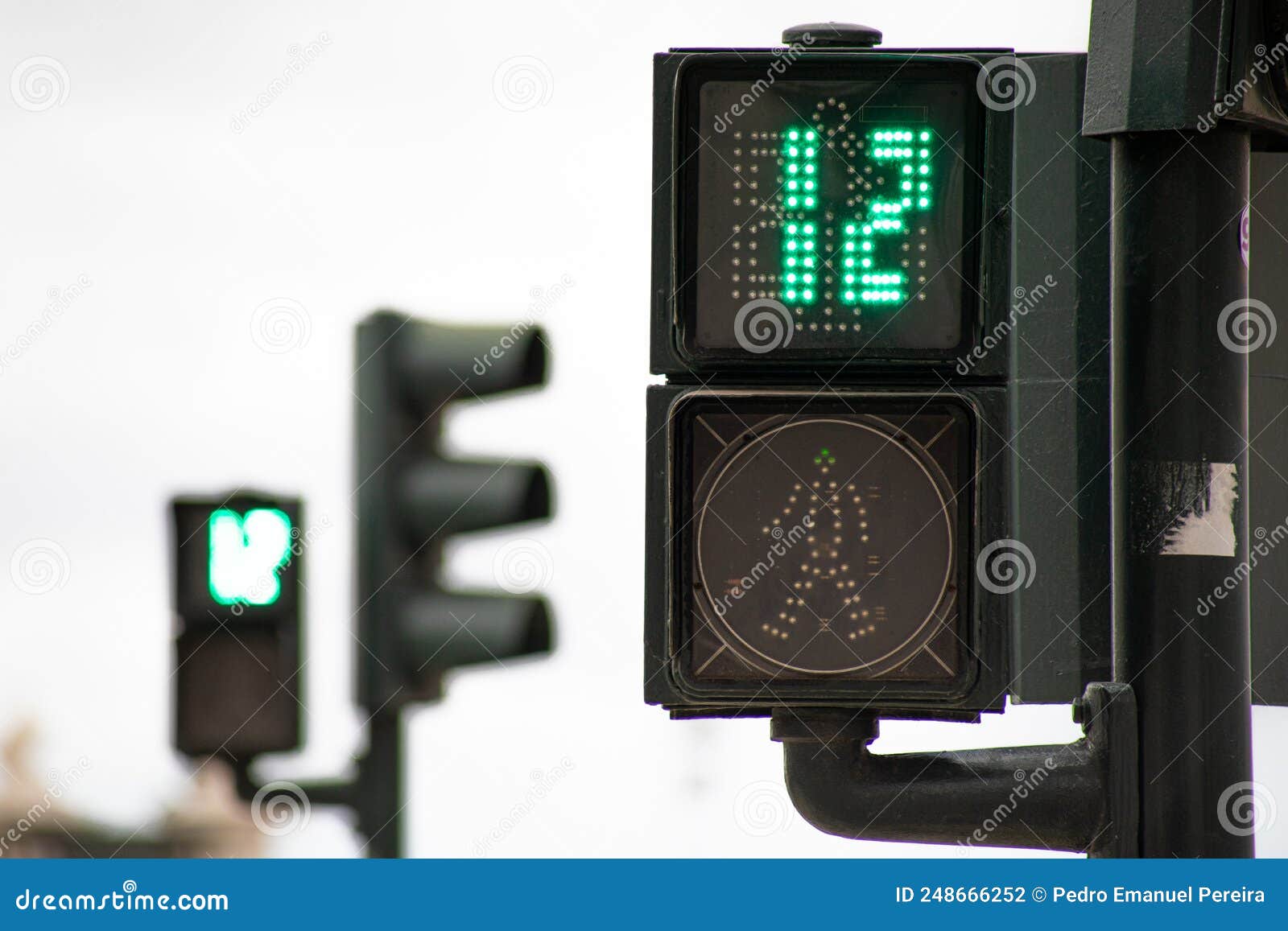 Green Traffic Light for Pedestrians Counting Down in 12 Seconds in ...