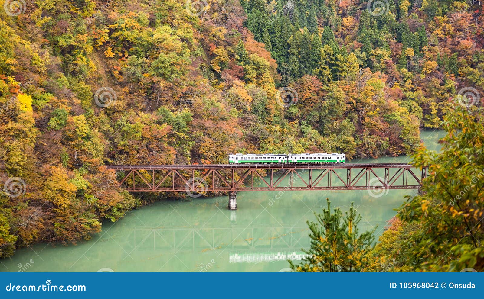 Train on bridge in autumn stock photo. Image of autumn - 105968042