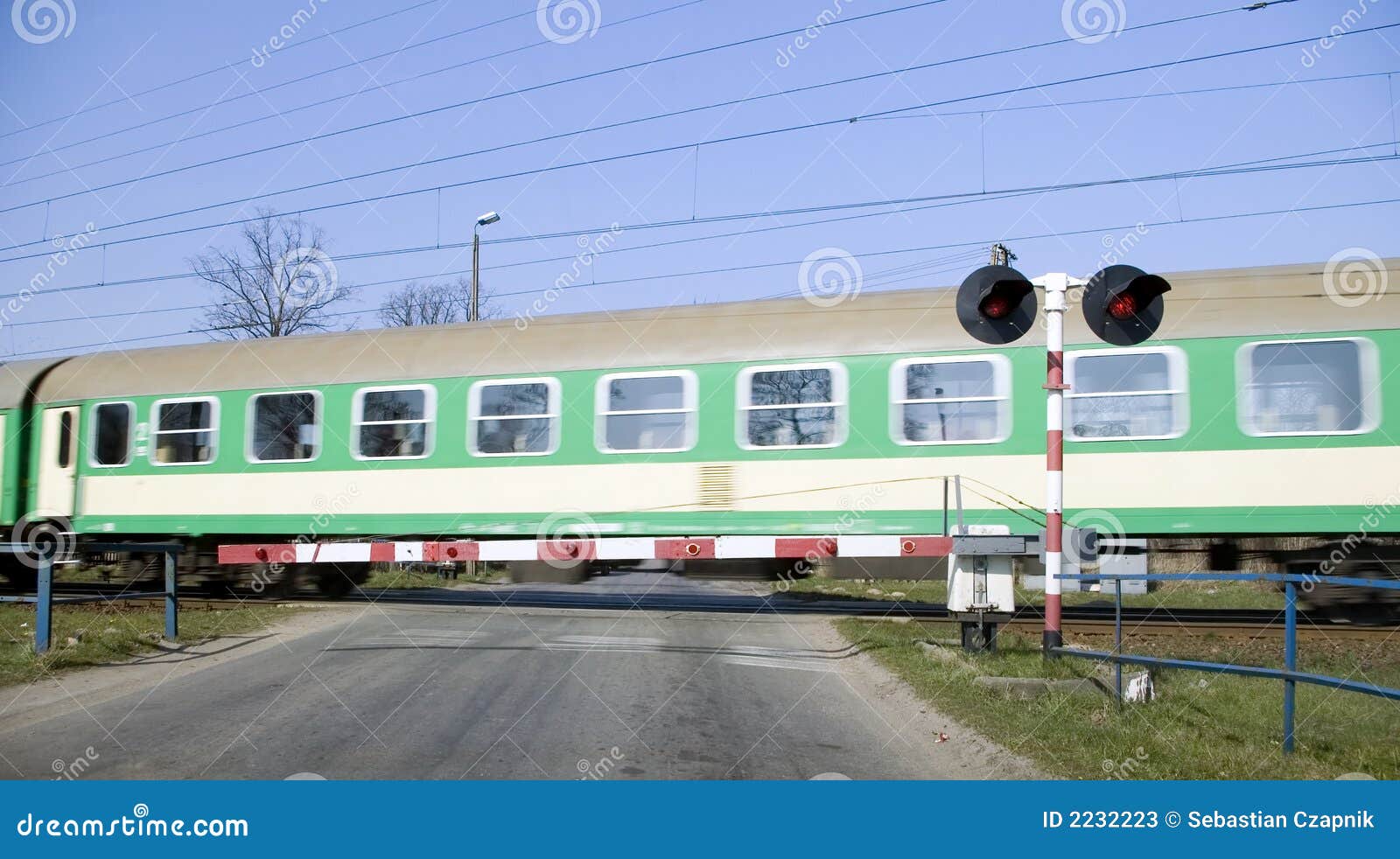 Green train crossing. stock image. Image of motion, clear - 2232223