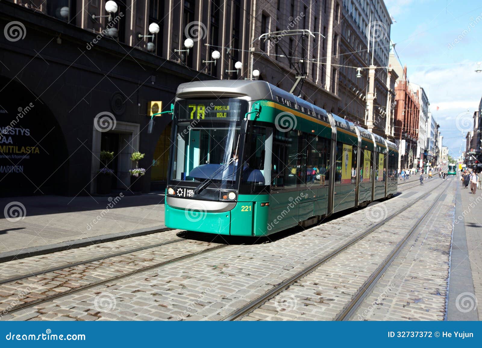 Green tram editorial photography. Image of blue, turn - 32737372