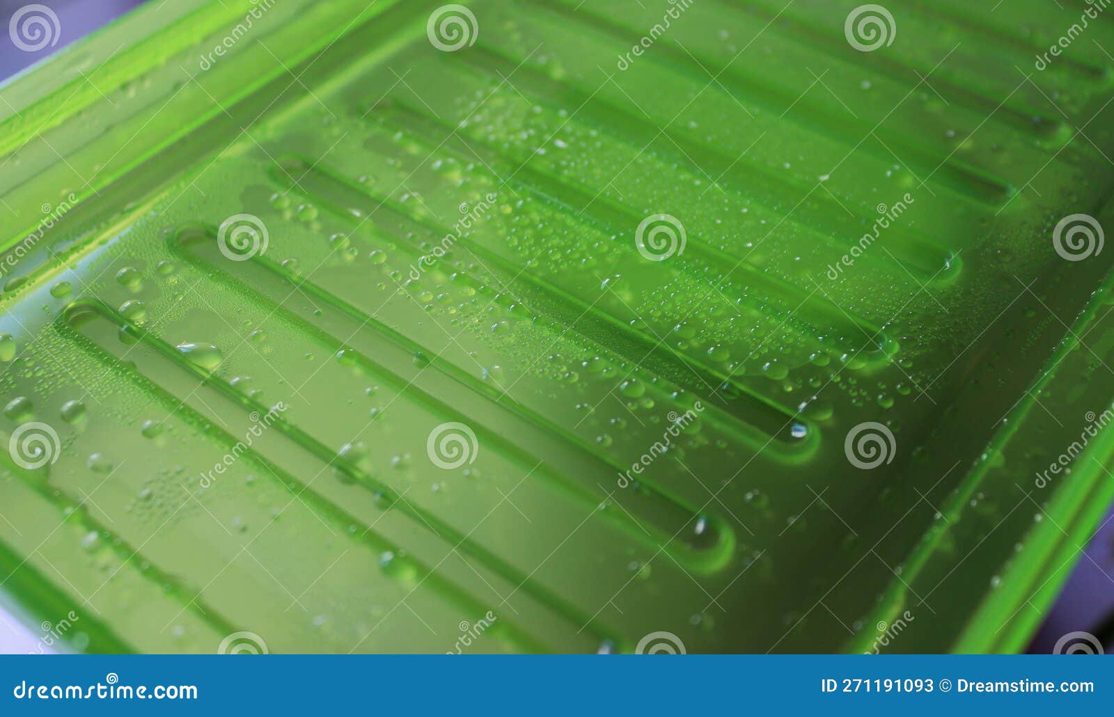 Pattern of Condensation Drops and Water Bulbs on a Green Plastic Close ...