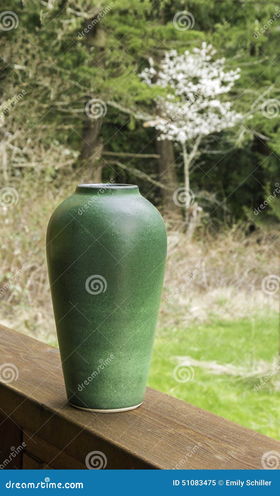 Green Vase Outdoors with Blooming Cherry Tree and Forest Stock Image ...