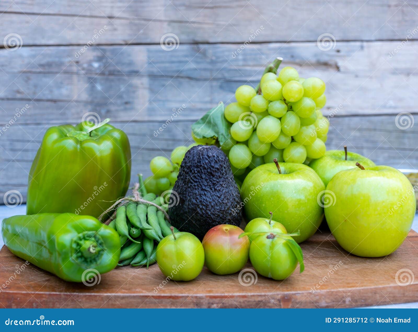 Green Vegetables and Fruits on a Chopping Board Stock Photo - Image of ...