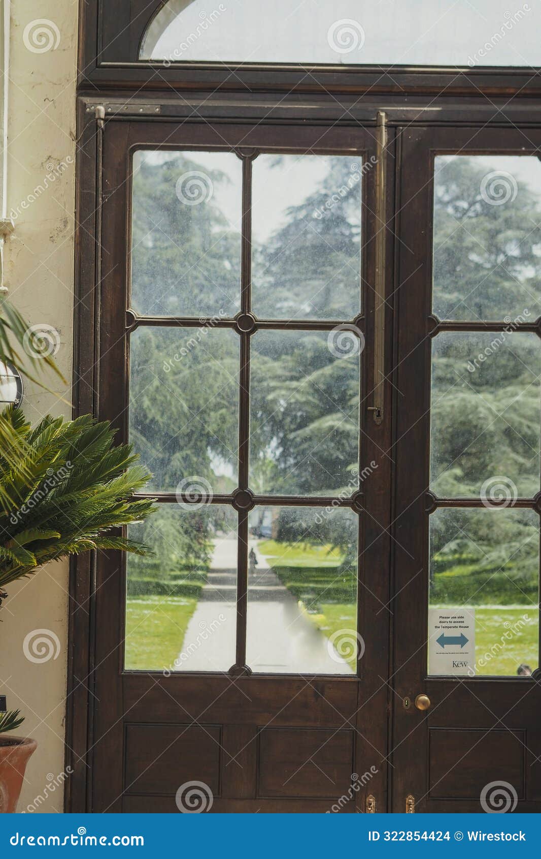 Green View through Double Doors Onto Garden and Path Stock Photo ...
