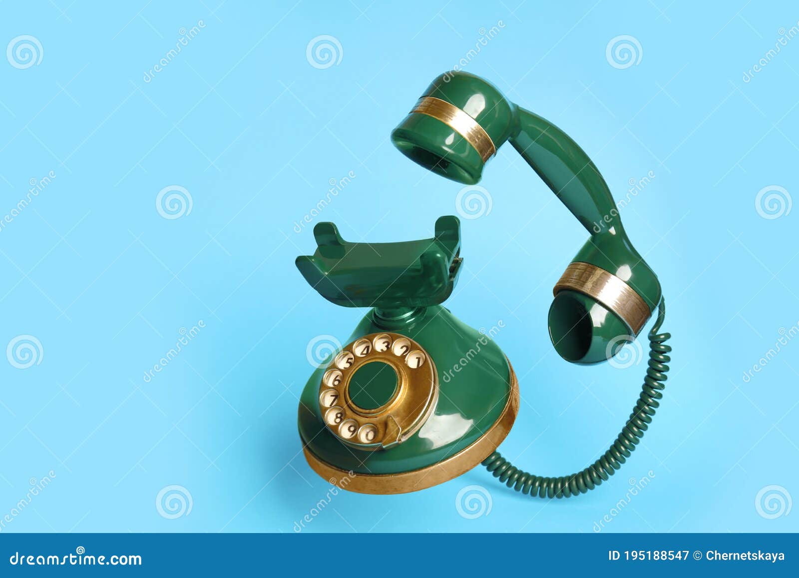 Green Vintage Corded Phone on Blue Background Stock Image - Image of ...