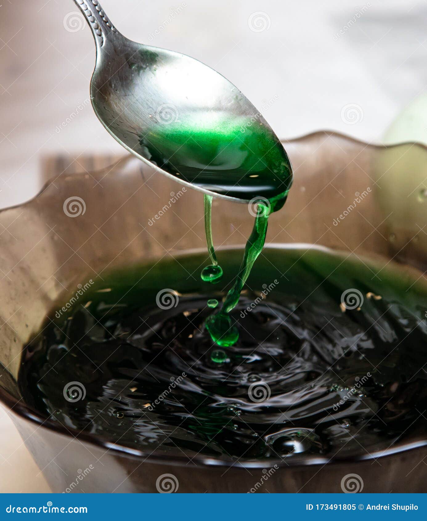Green Water Flows Down from a Spoon Stock Image - Image of easter ...