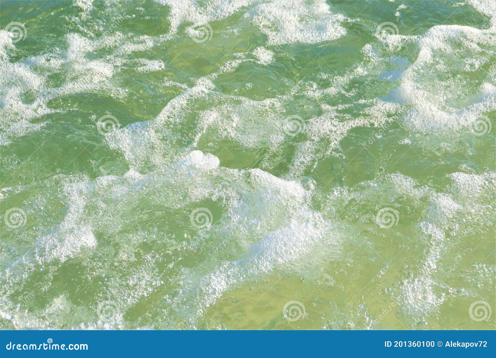 The Green Wave Comes from the Ocean, Breaks into Splashes on the Shore ...