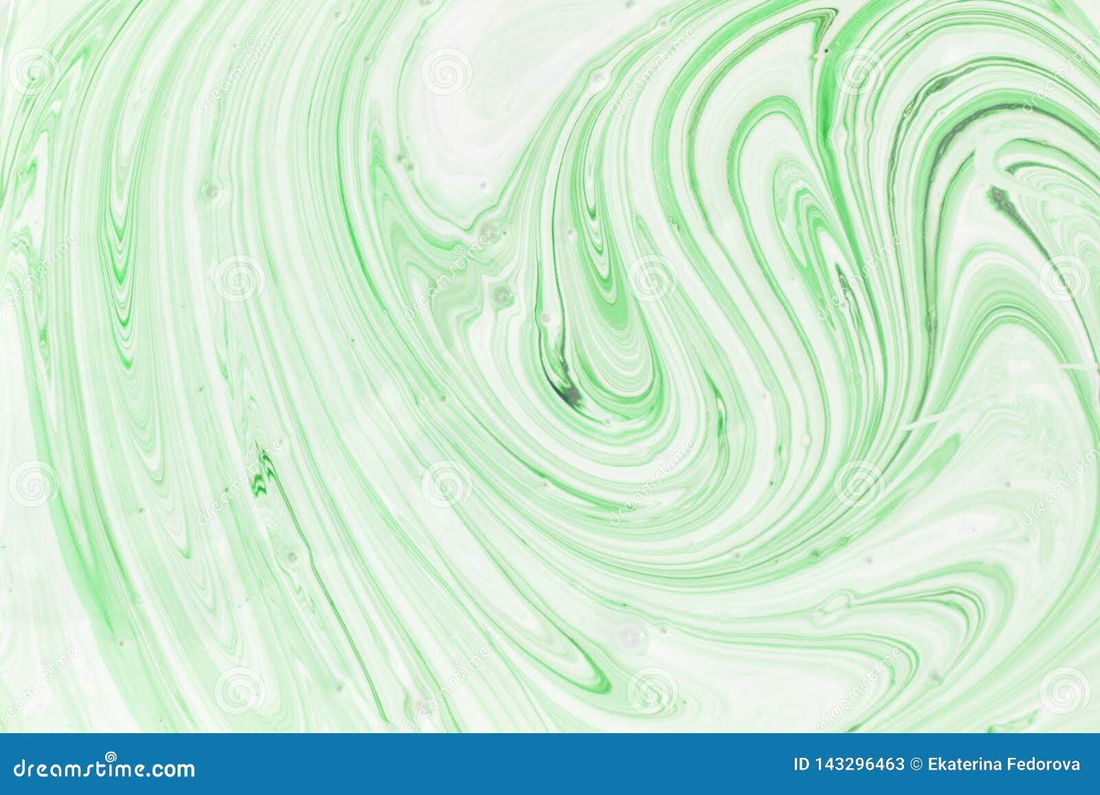 Green and White Paint Mixed Up Creating a Beautiful Abstract Pattern ...