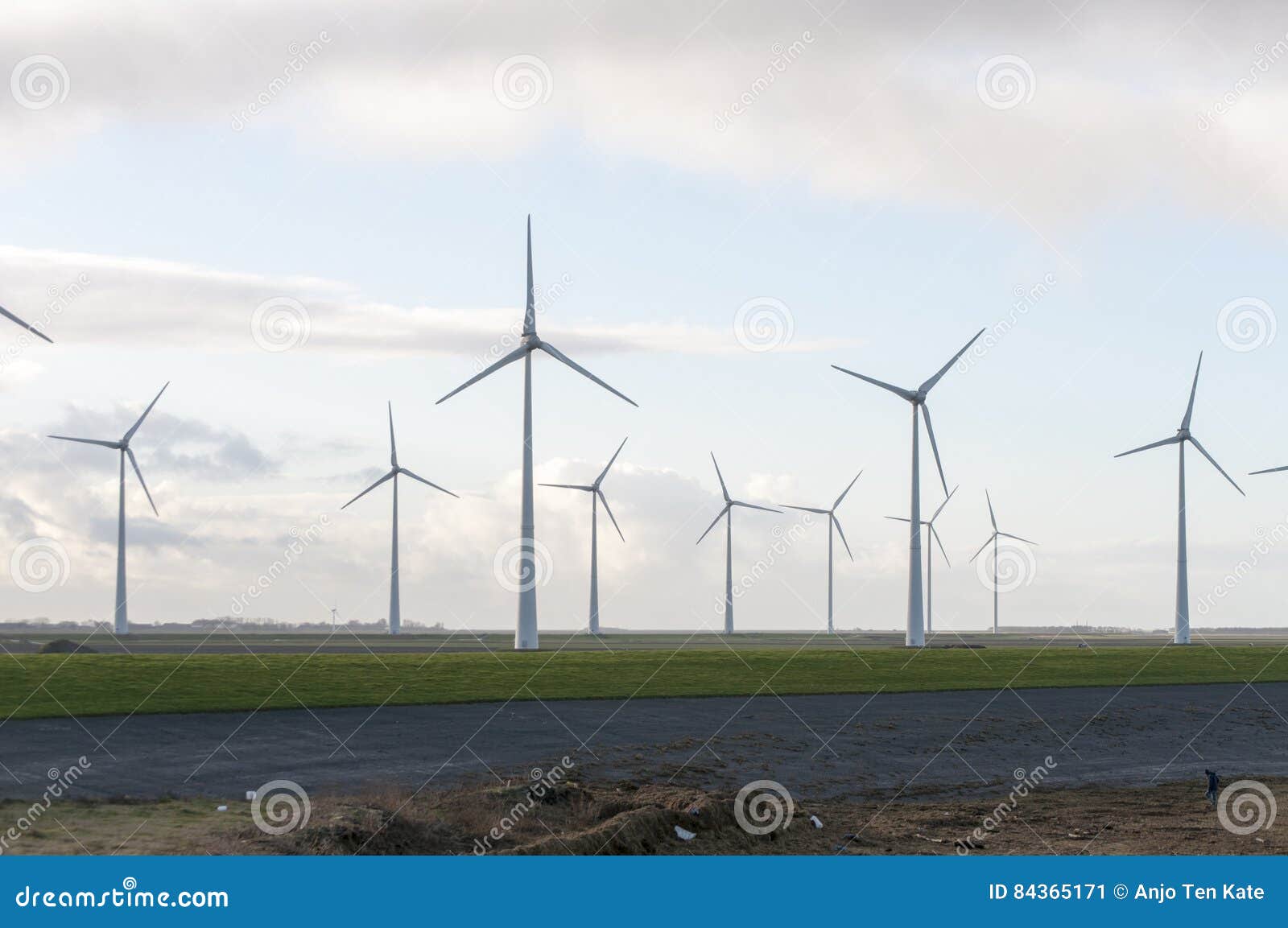 Green wind energy field stock image. Image of windmill - 84365171