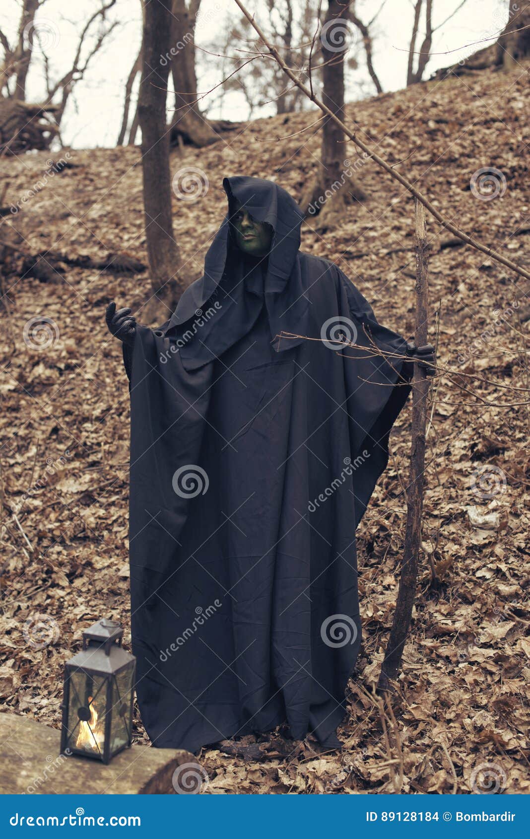 The Green Witch in the Autumn Forest Stock Photo - Image of halloween ...