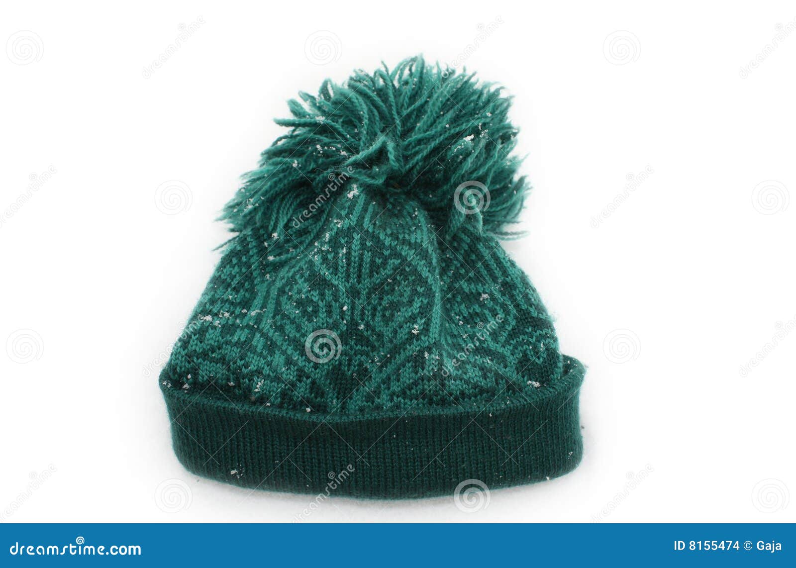 Green Wollen Hat in the Snow Stock Photo - Image of winter, knitted ...