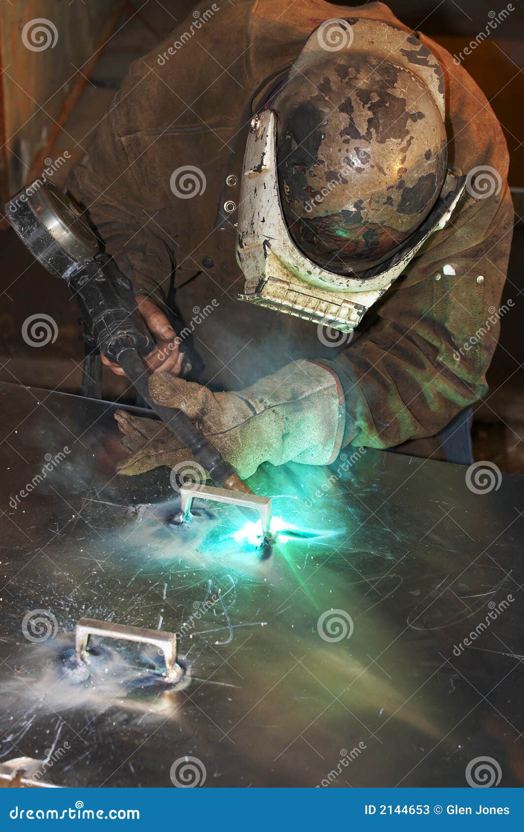 Green worker stock image. Image of craftsman, smoke, occupation - 2144653