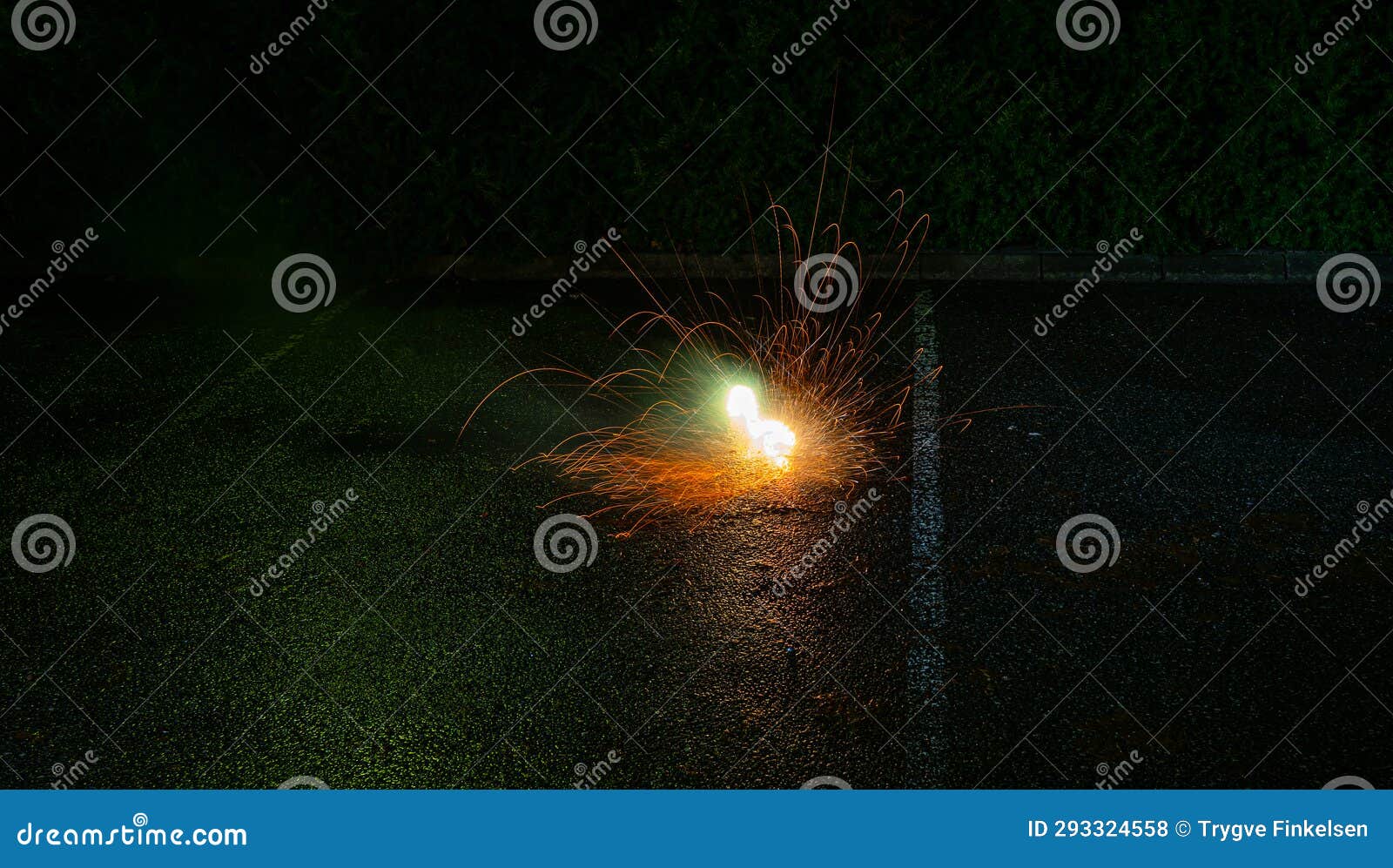 Green and Yellow Ground Fireworks on Asphalt.. Stock Photo - Image of ...