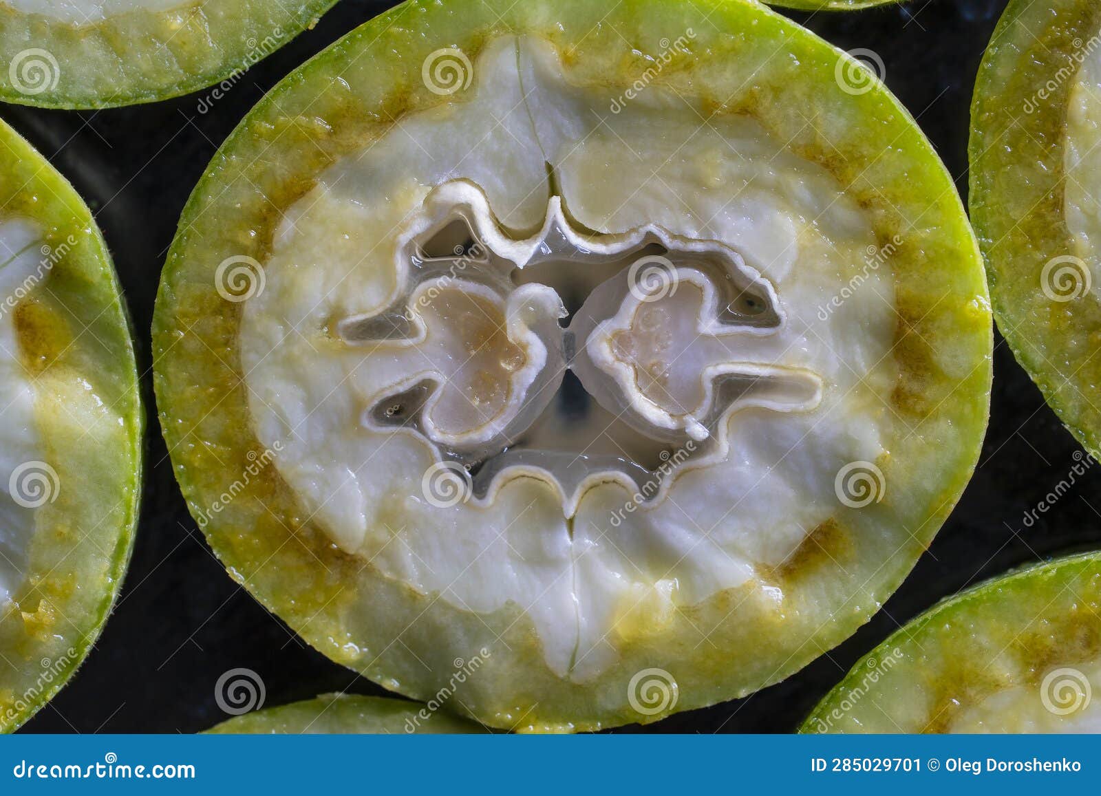 Green Young Walnuts Cut in Half, Texture or Background, Macro, Top View ...