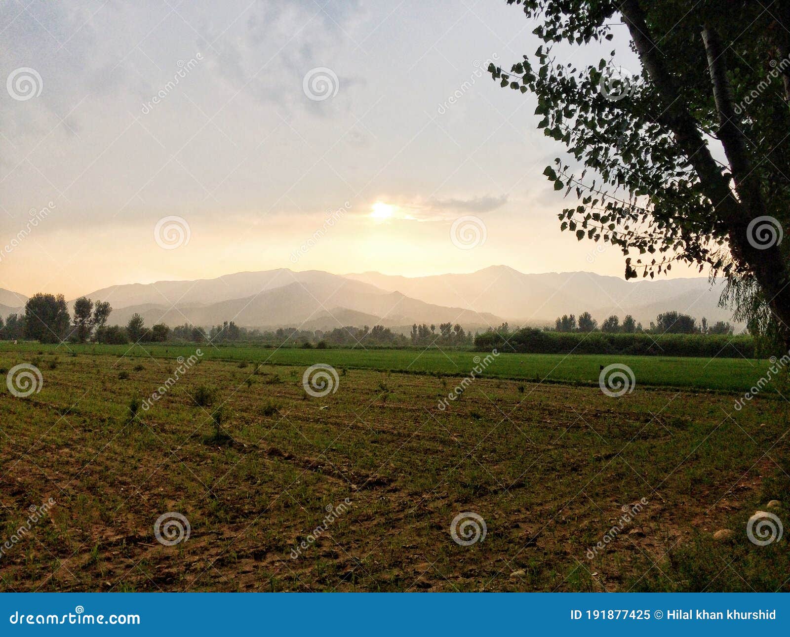 Field with sun set stock image. Image of mountains, side - 191877425