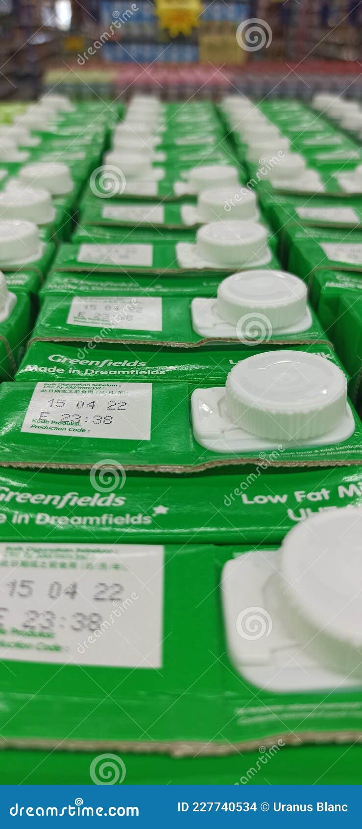 Green Packaging UHT Milk at Supermarket Stock Photo - Image of milk ...