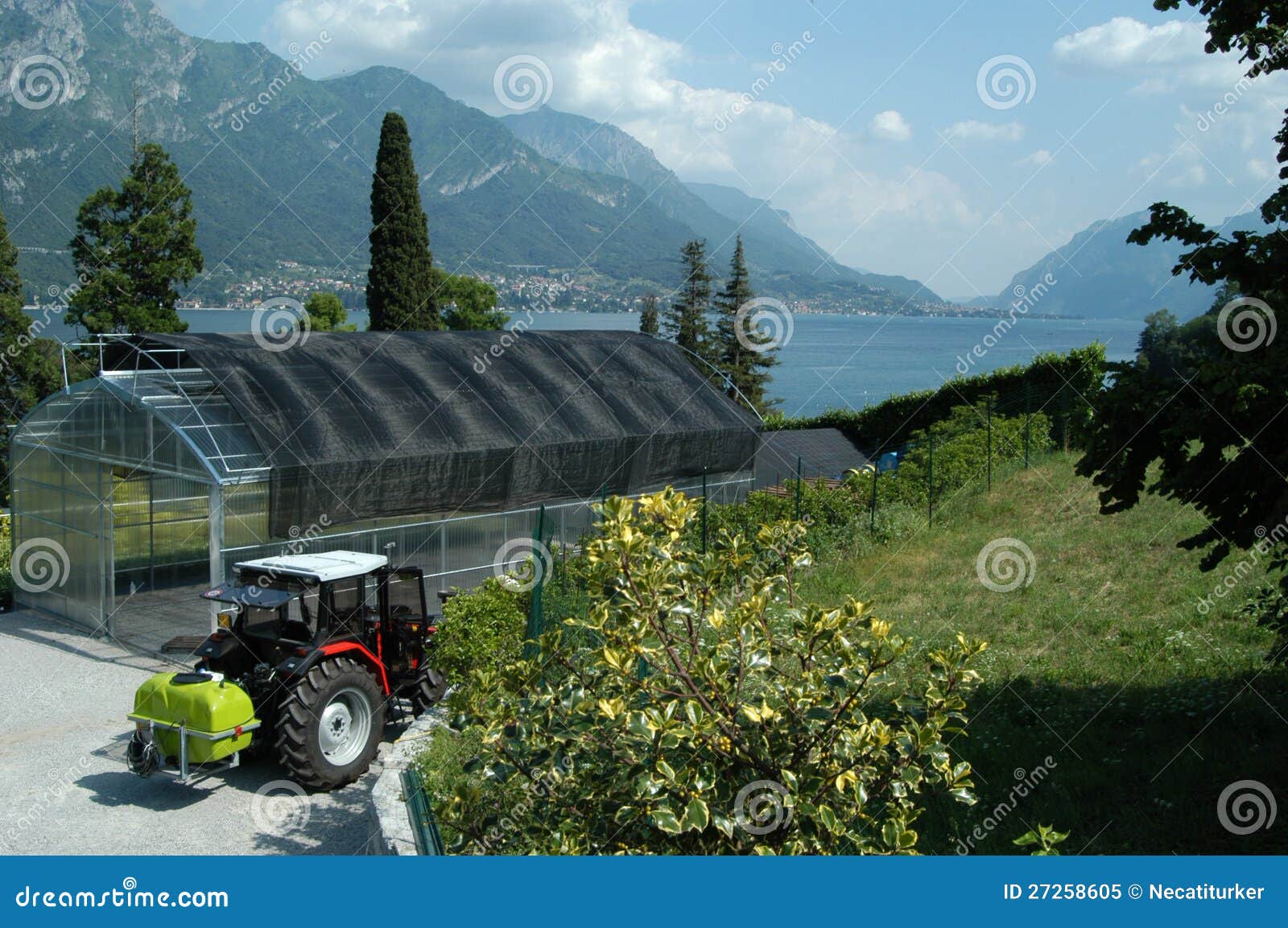 Greenhouse and Tractor with Beautiful Landscape Stock Image - Image of ...