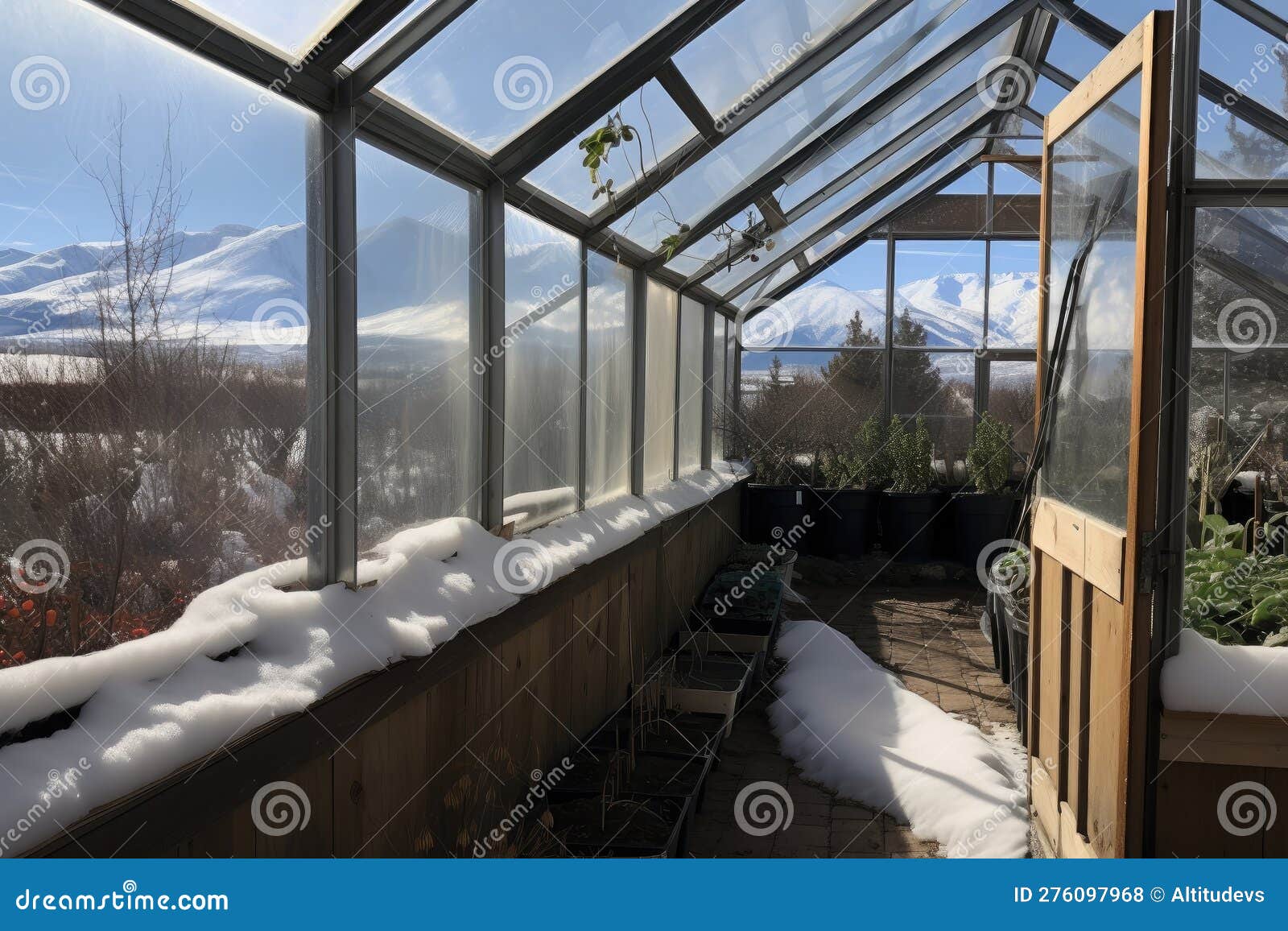 Greenhouse, with View of Snowy Mountain Range in the Background Stock ...