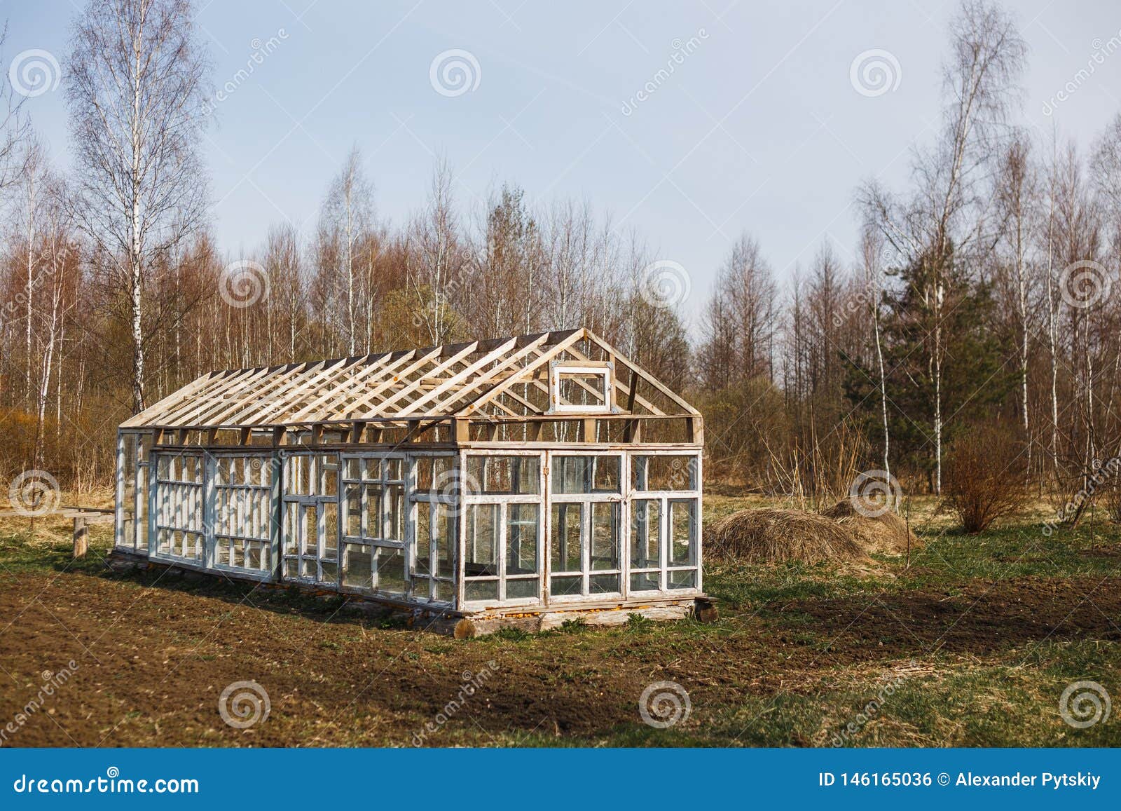 Greenhouse from the Windows in the Garden in Early Spring Stock Photo ...