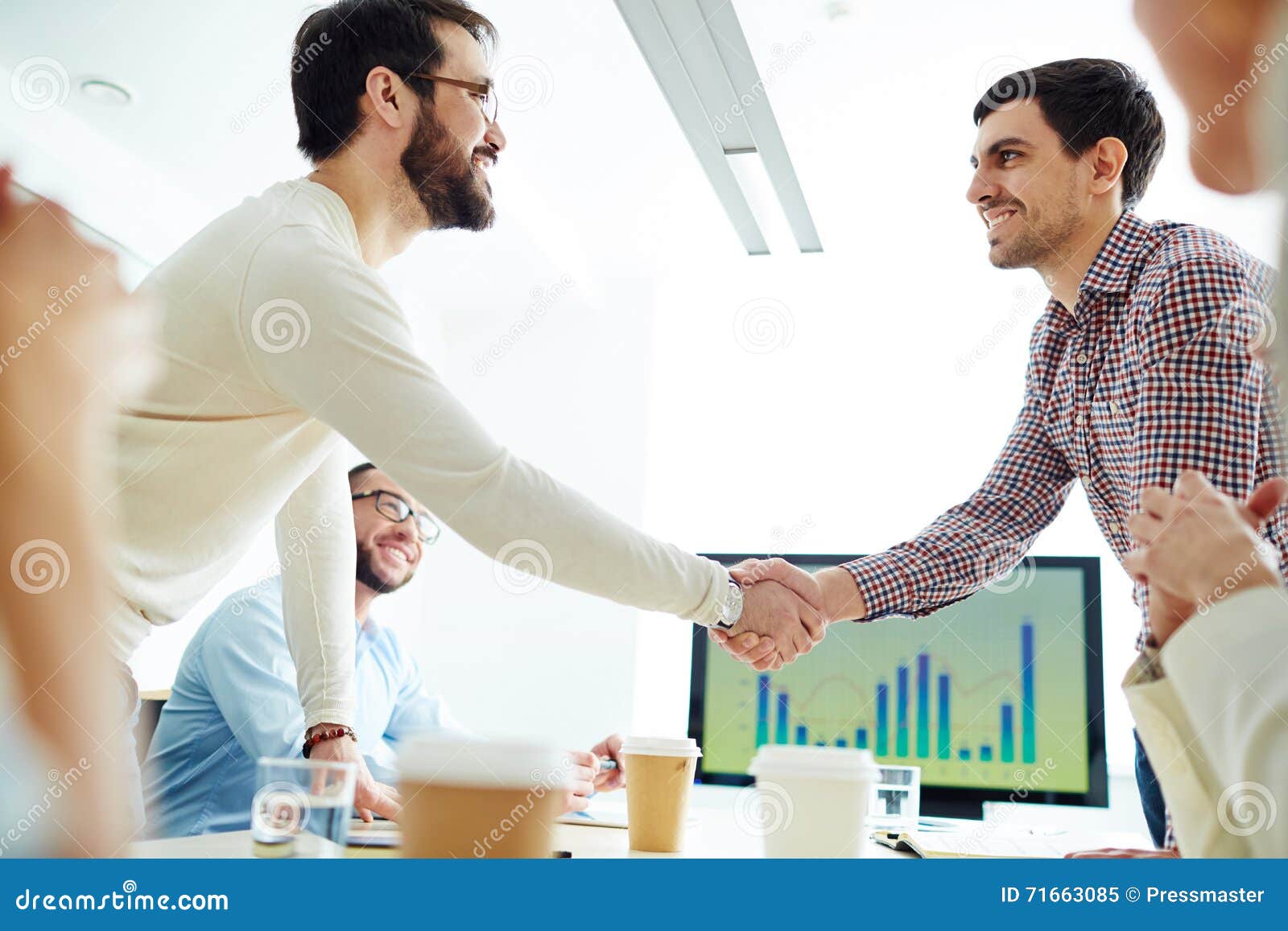 Greeting colleagues stock image. Image of business, people - 71663085
