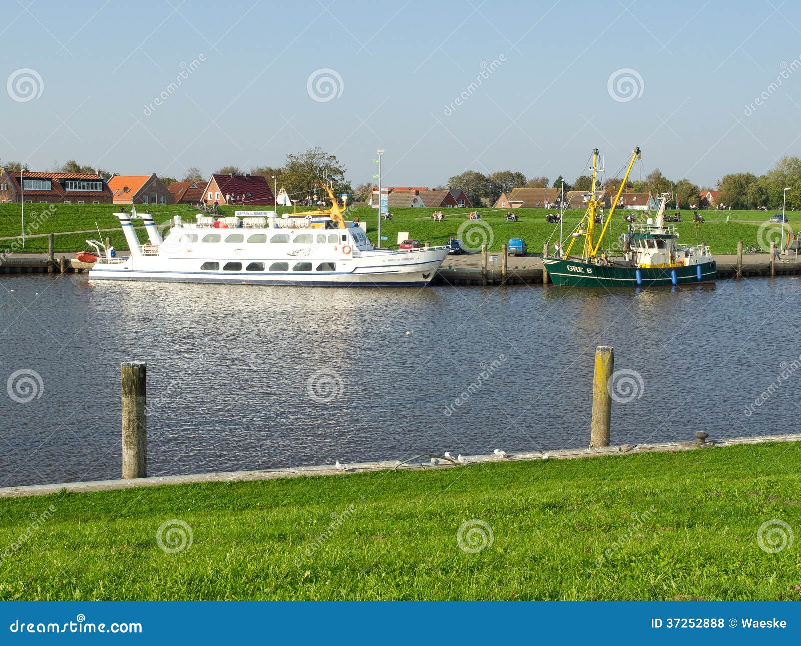 Greetsiel and the Krummhoern Stock Photo - Image of sheep, lighthouse ...
