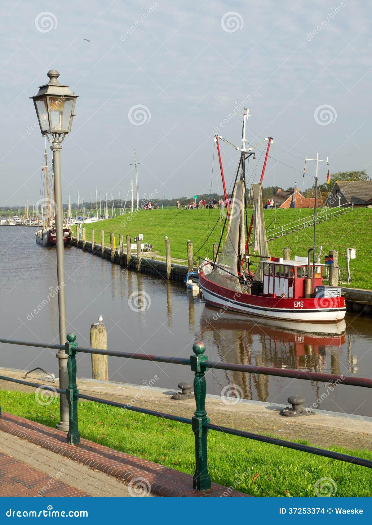 Greetsiel and the Krummhoern Stock Photo - Image of harbour, lighthouse ...
