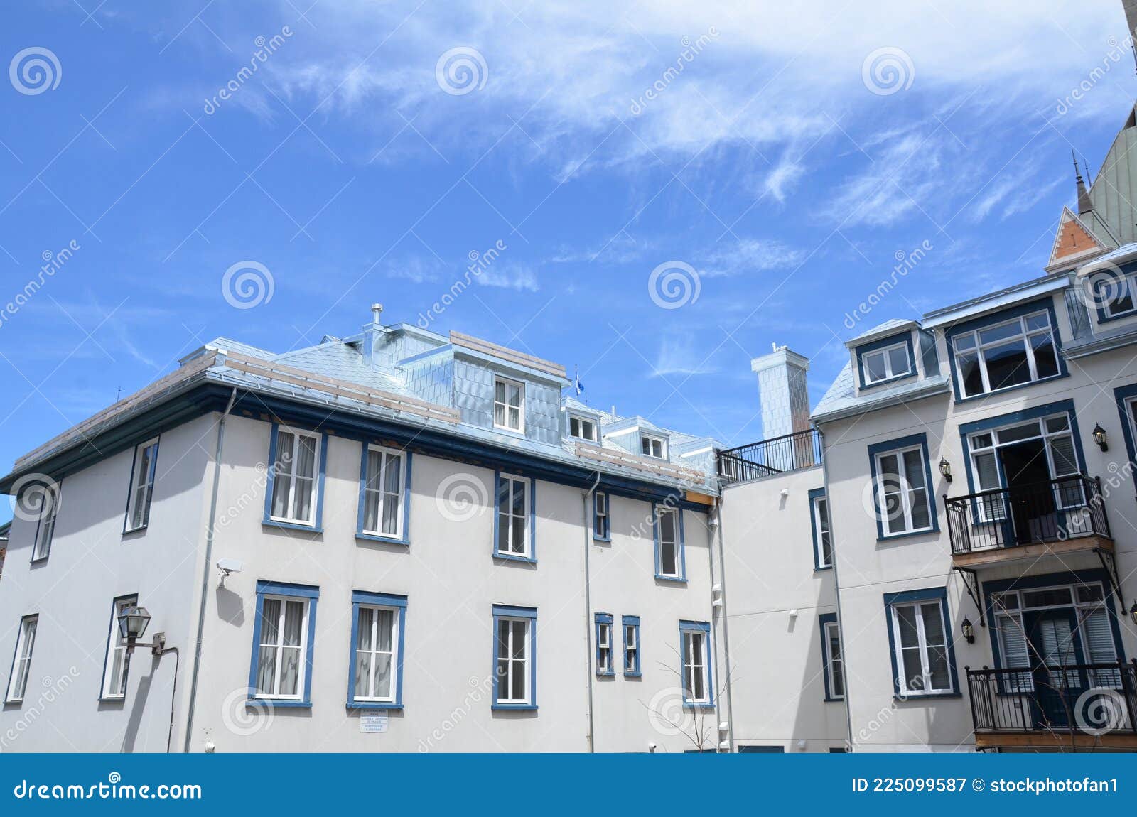 Grey Building or Structure with Blue Windows and Sky Stock Image ...