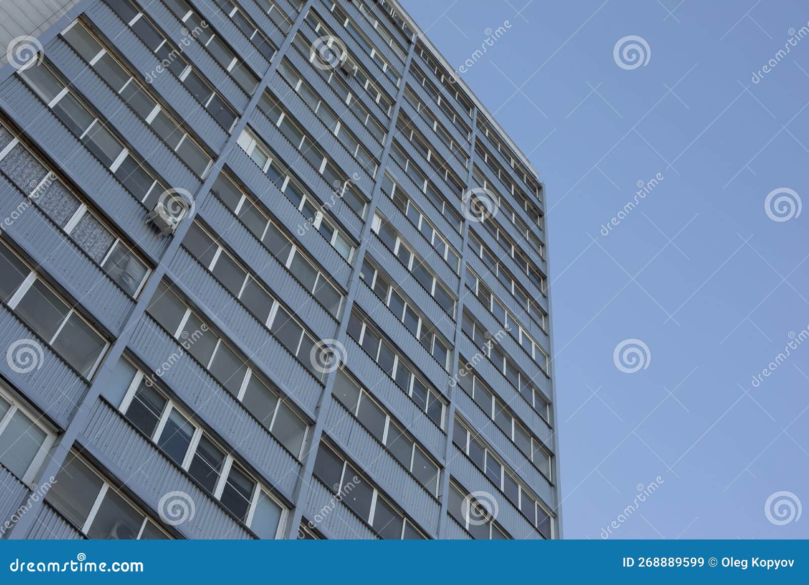 Grey Building with Windows. Tall Building in City Stock Image - Image ...