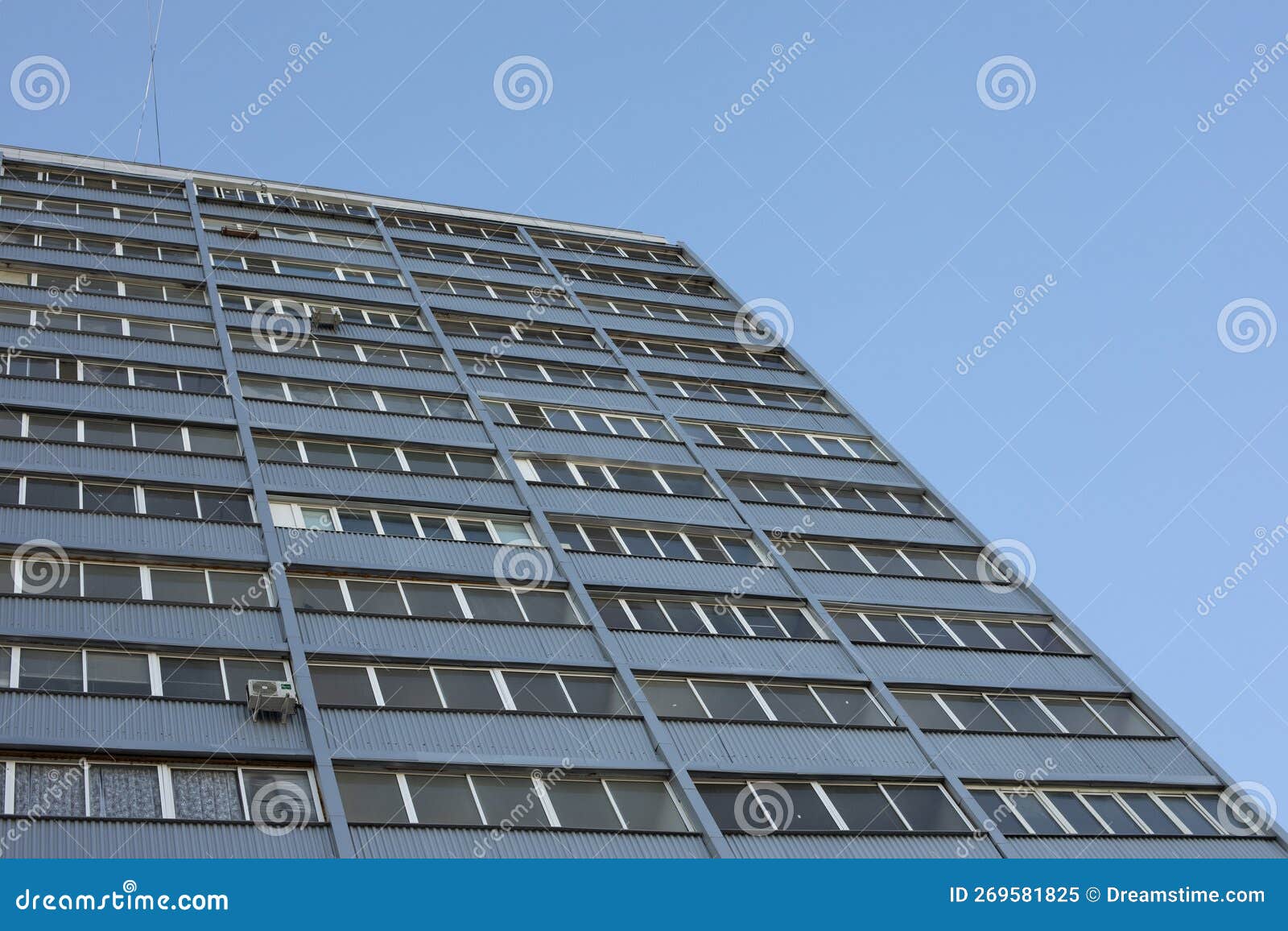 Grey Building with Windows. Tall Building in City Stock Image - Image ...