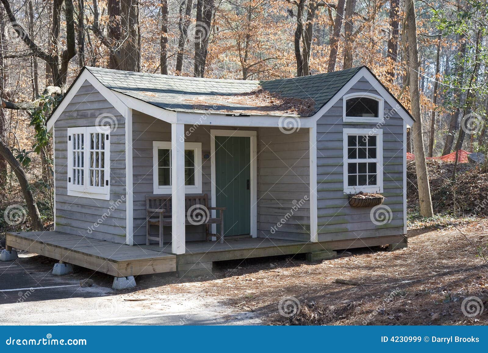 Grey Cabin with Green Door stock image. Image of rural - 4230999