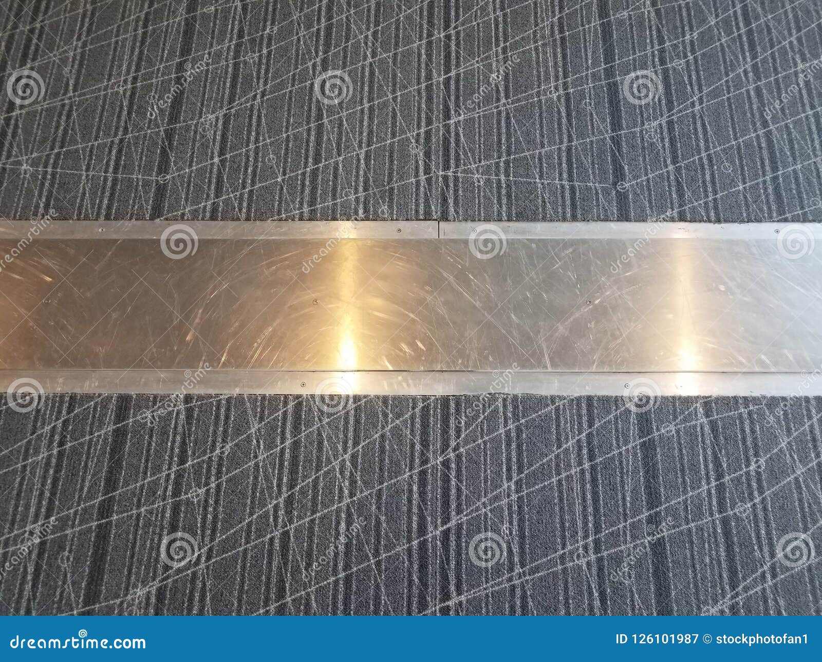Grey Carpet or Rug with White Lines and Metal Strip Stock Image - Image ...