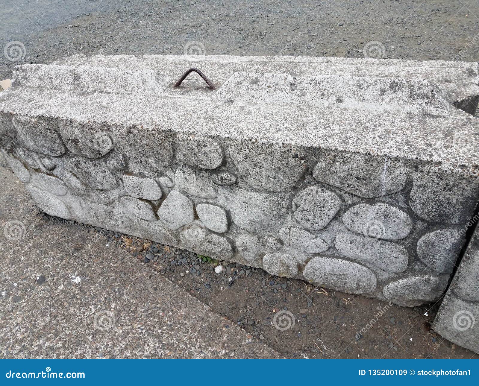 Grey Cement Barricade with Stones and Metal Stock Image - Image of gray ...