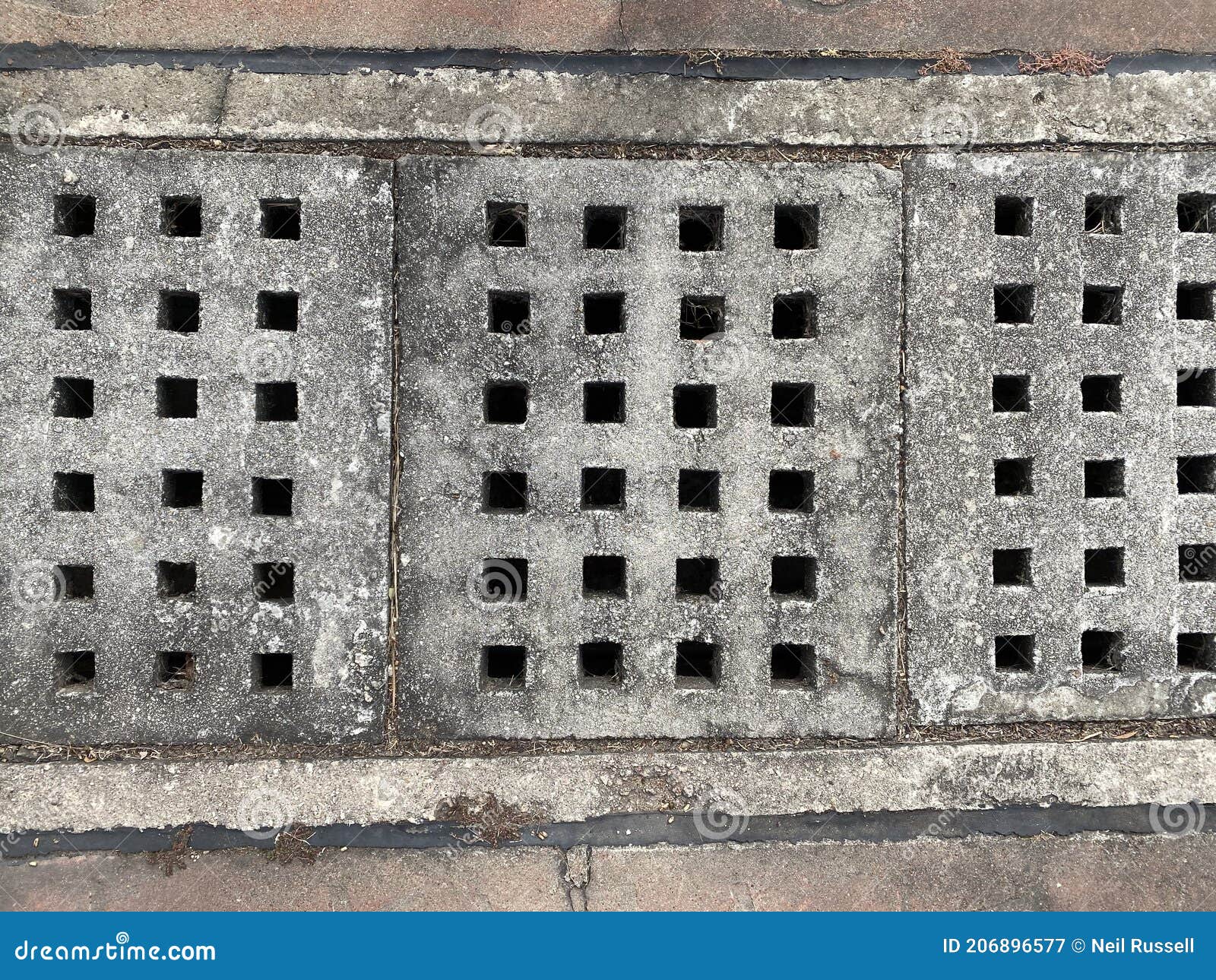 Grey Storm Drain Covers stock image. Image of holes - 206896577