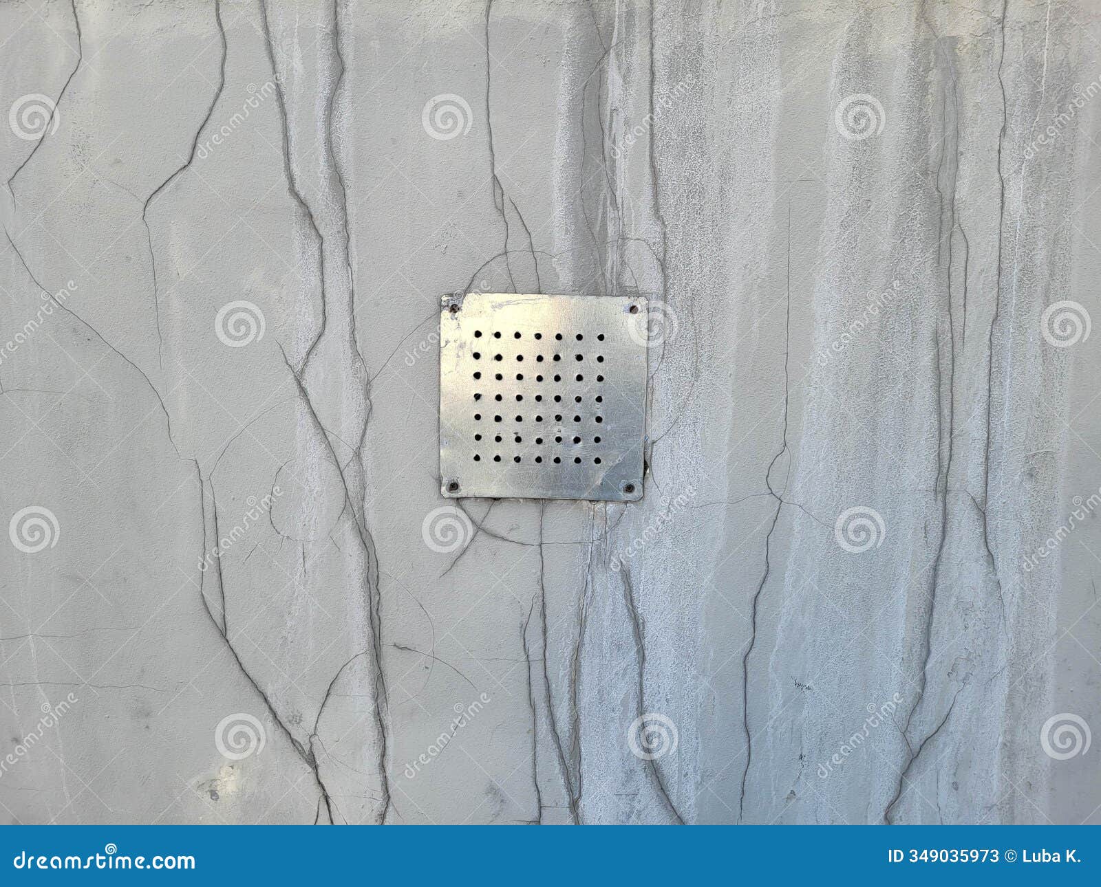 Grey Cracked Plastered Wall after Rain with Aluminum Ventilation Grate ...
