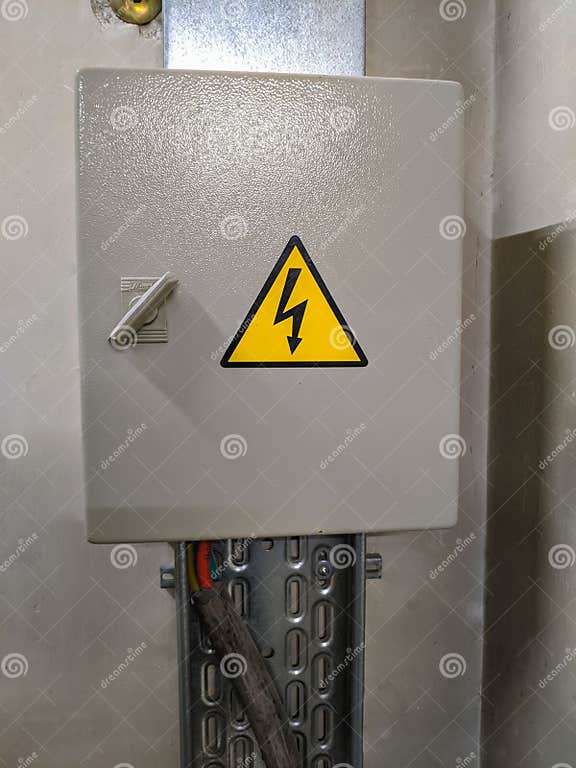 Grey Electrical Panel with Electrical Hazard Symbol Stock Image - Image ...