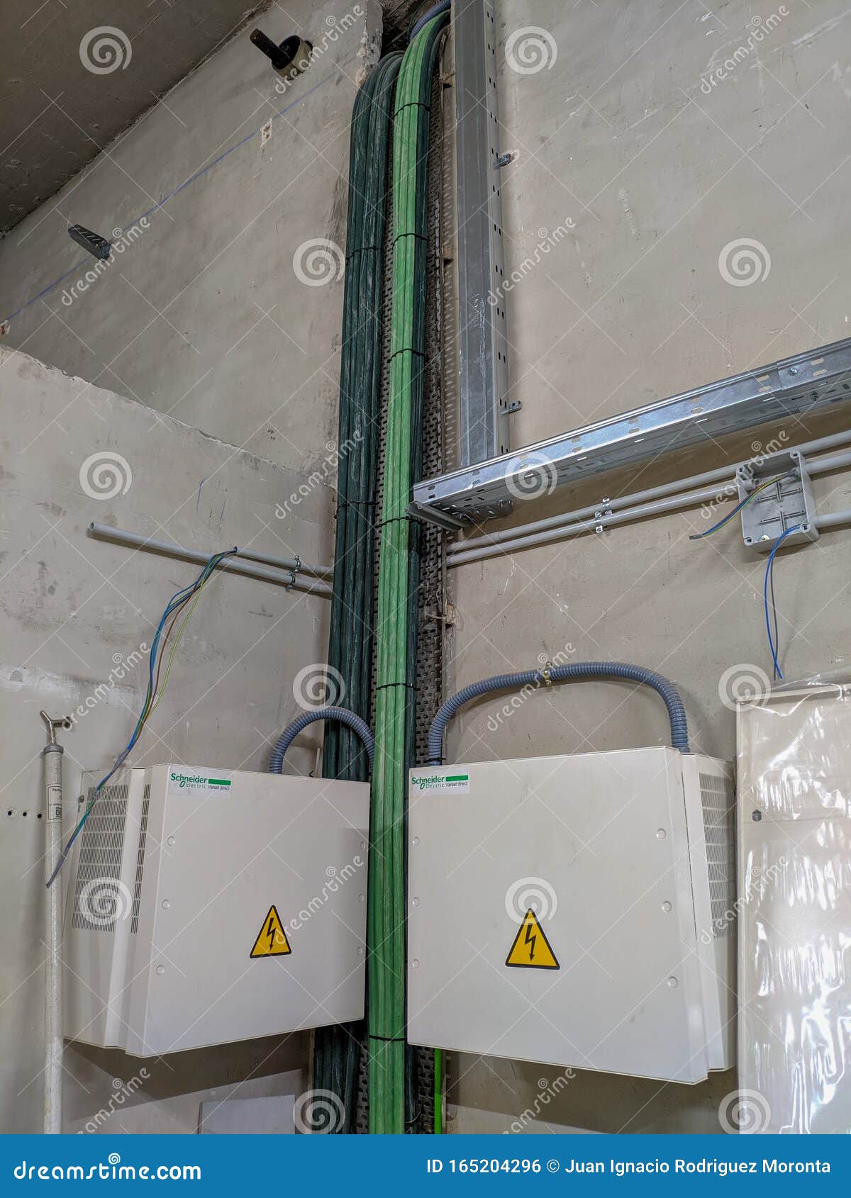 Grey Electrical Panels and Cables Entering Them Stock Photo - Image of ...