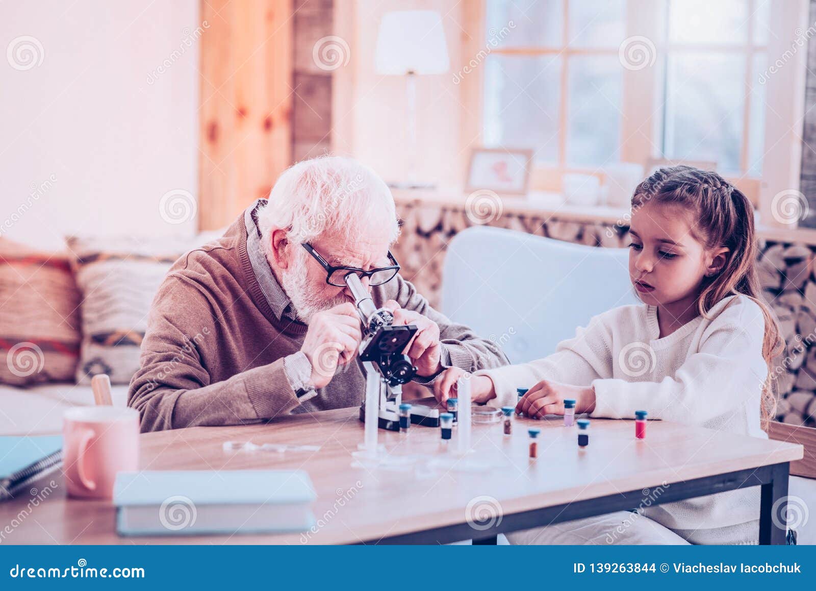 Grey-haired Man Watching in Modern Small Microscope Stock Photo - Image ...