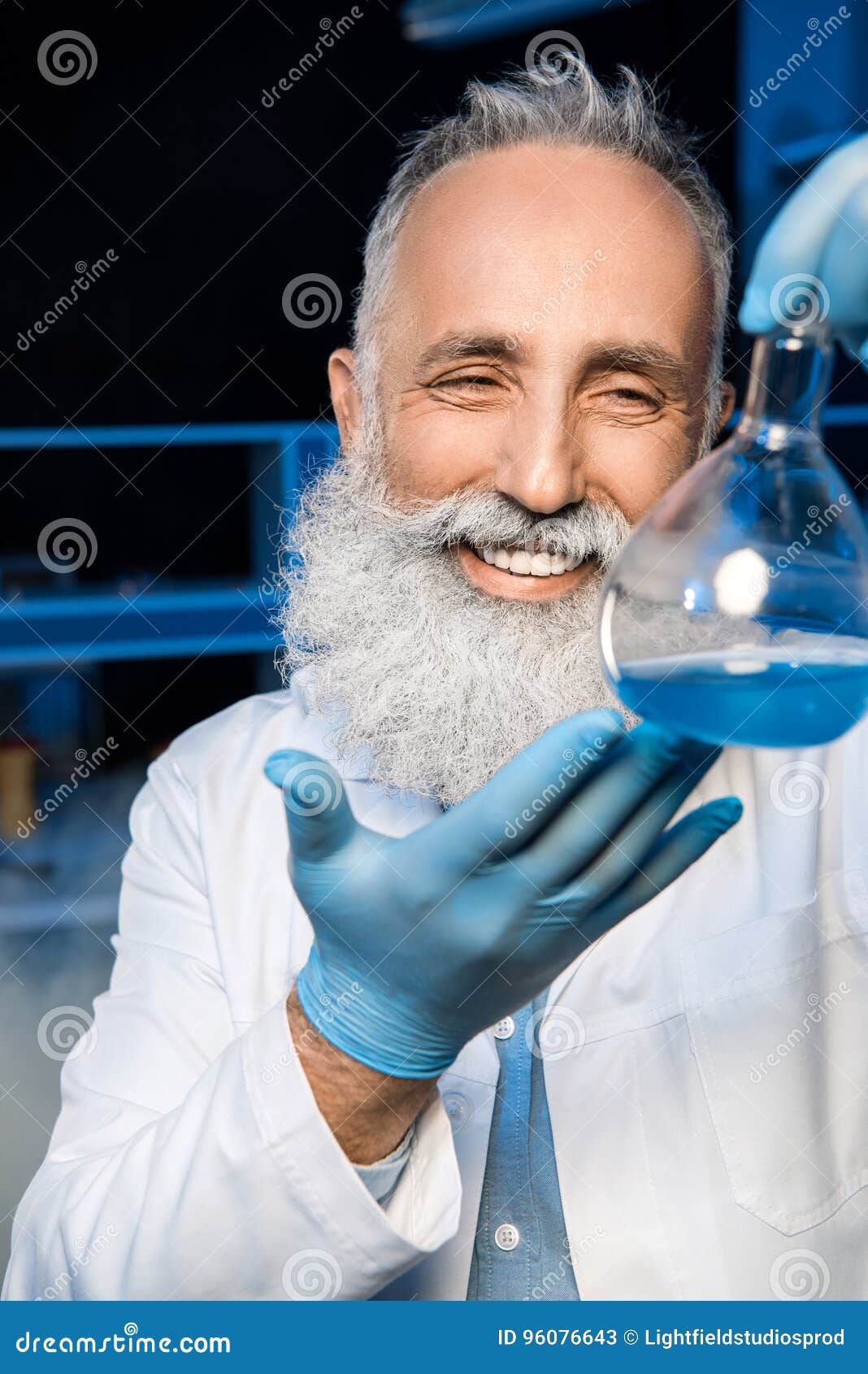 Grey Haired Scientist in Lab Coat Holding Flask with Reagent at ...
