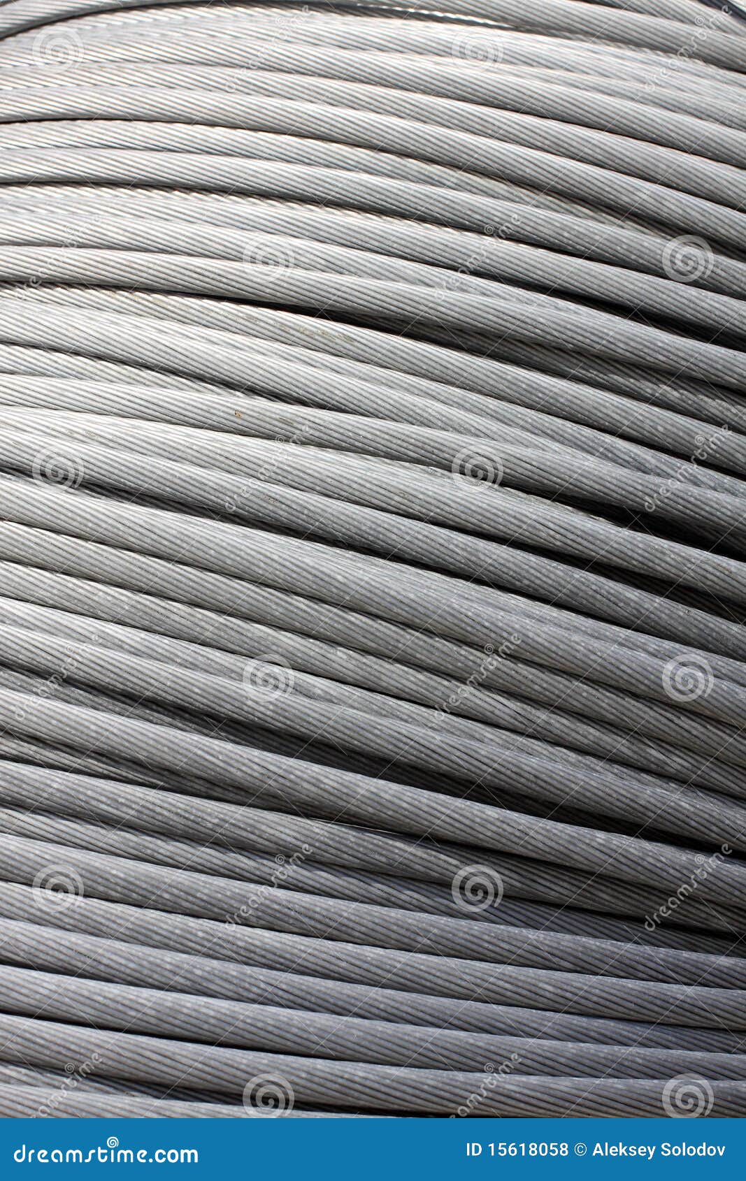 Grey metal cable stock photo. Image of coil, rolled, coiled - 15618058