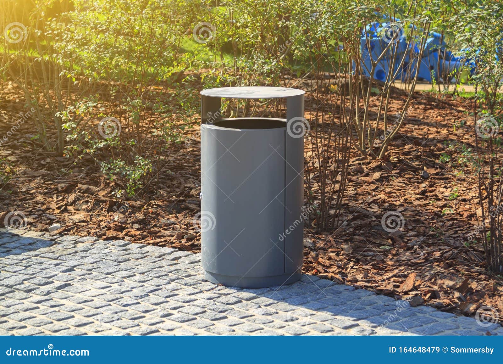 Grey Minimalist Dustbin with Mulched Landscape in City Park Stock Image ...