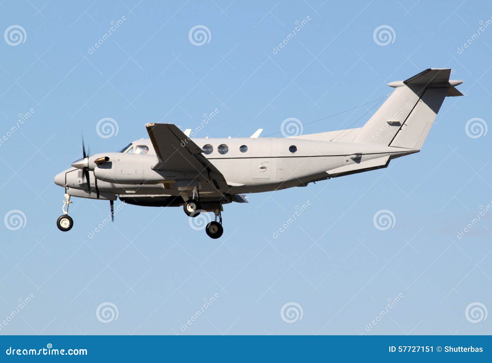 Grey plane landing stock image. Image of expensive, flight - 57727151