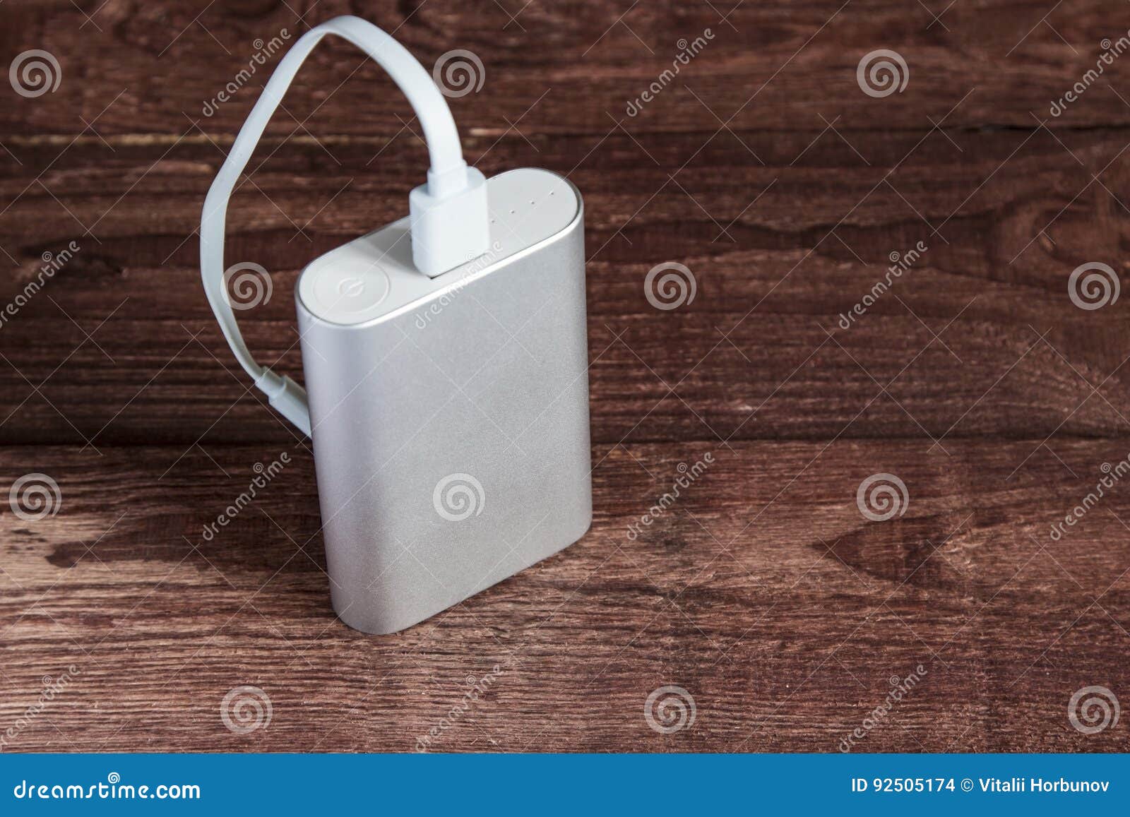 Grey Powerbank on a Wooden Background Stock Photo - Image of display ...