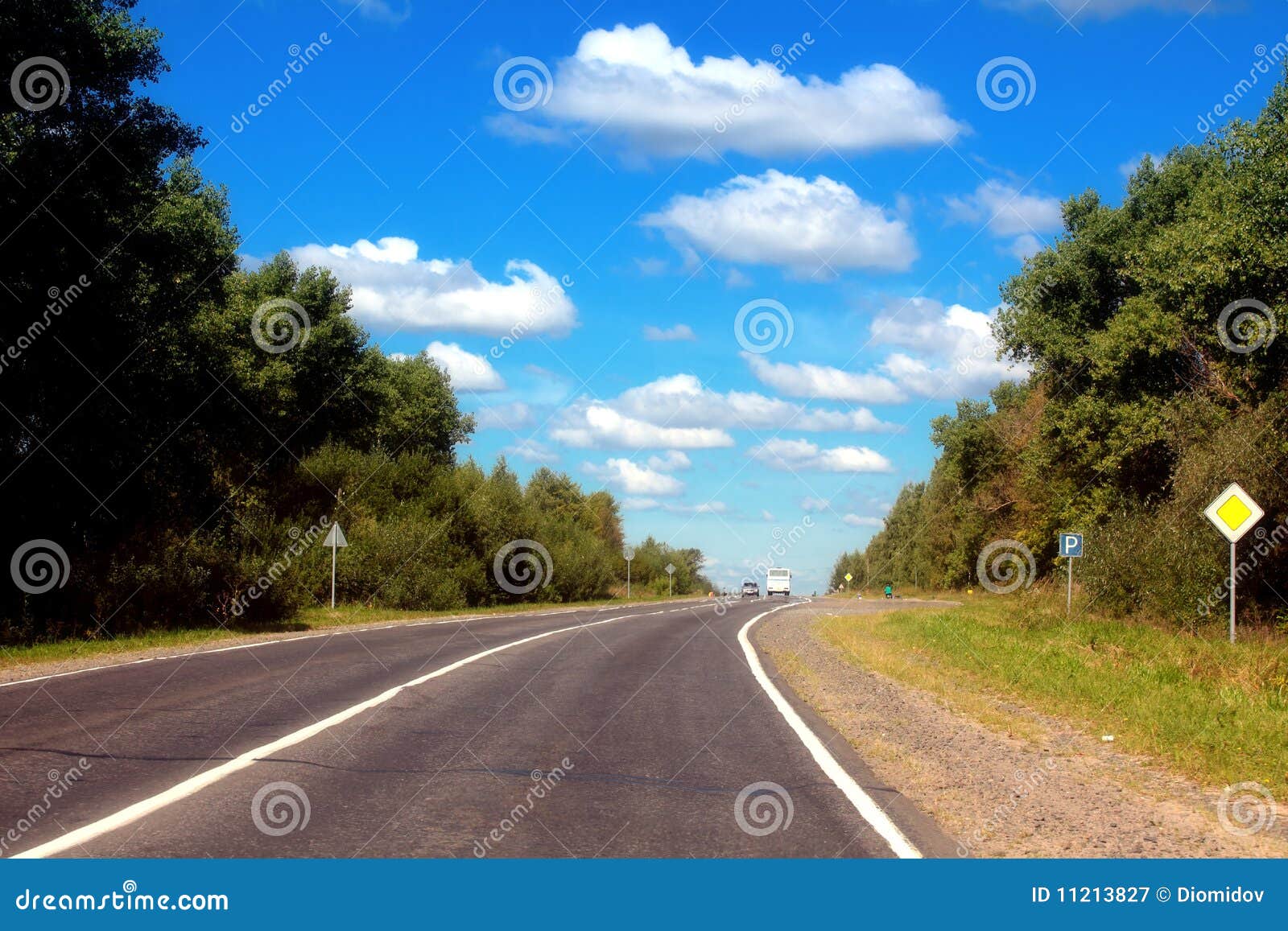 Grey road and blue sky stock image. Image of direction - 11213827