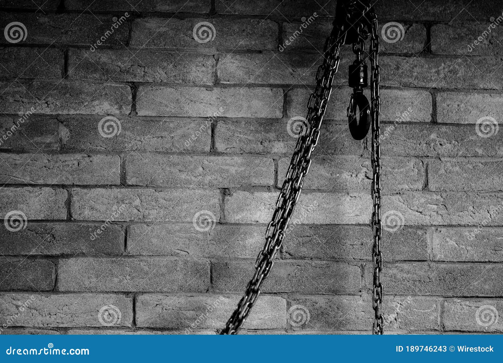 Grey Scale Shot of Metallic Chains with a Background of a Bricked Wall ...